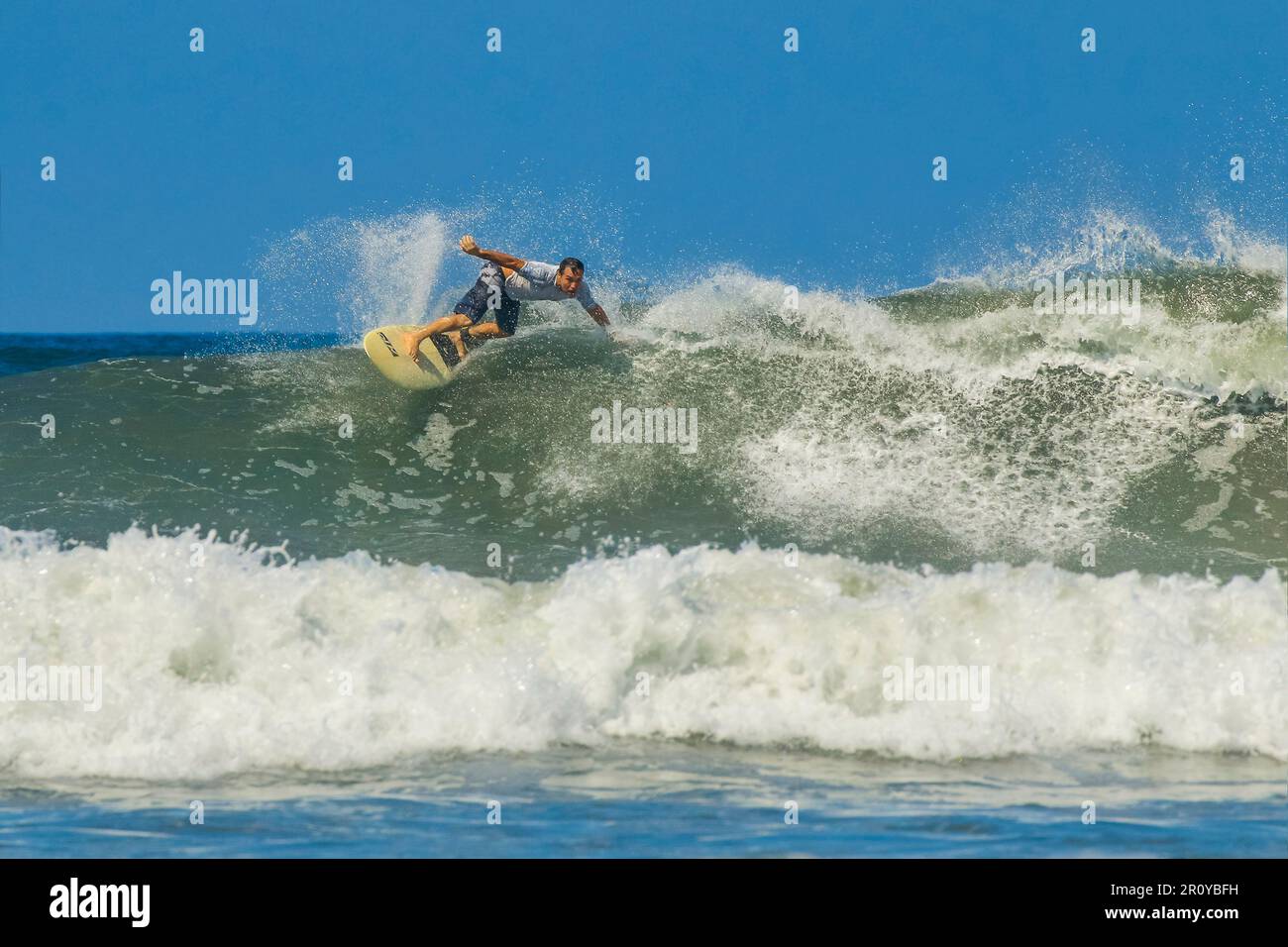 Shortboard surfer does a cutback turn on a wave at this fast-growing ...