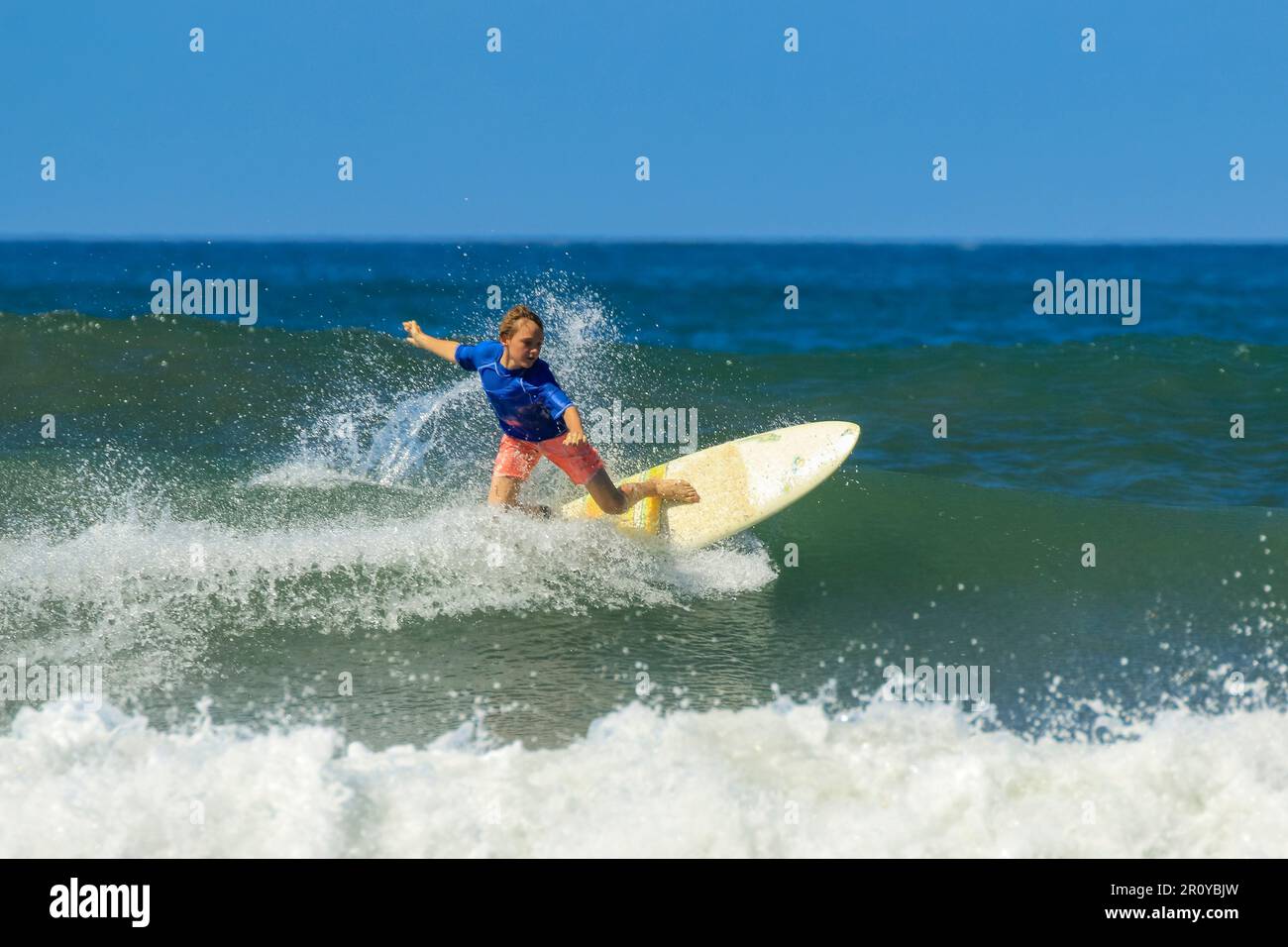 Shortboard surfer does a cutback turn on a wave at this fast-growing ...