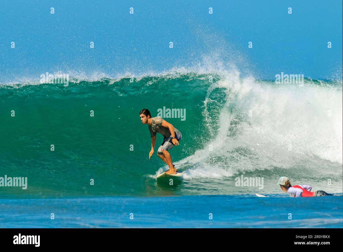 Shortboard surfer rides an overhead wave at this fast-growing surf ...