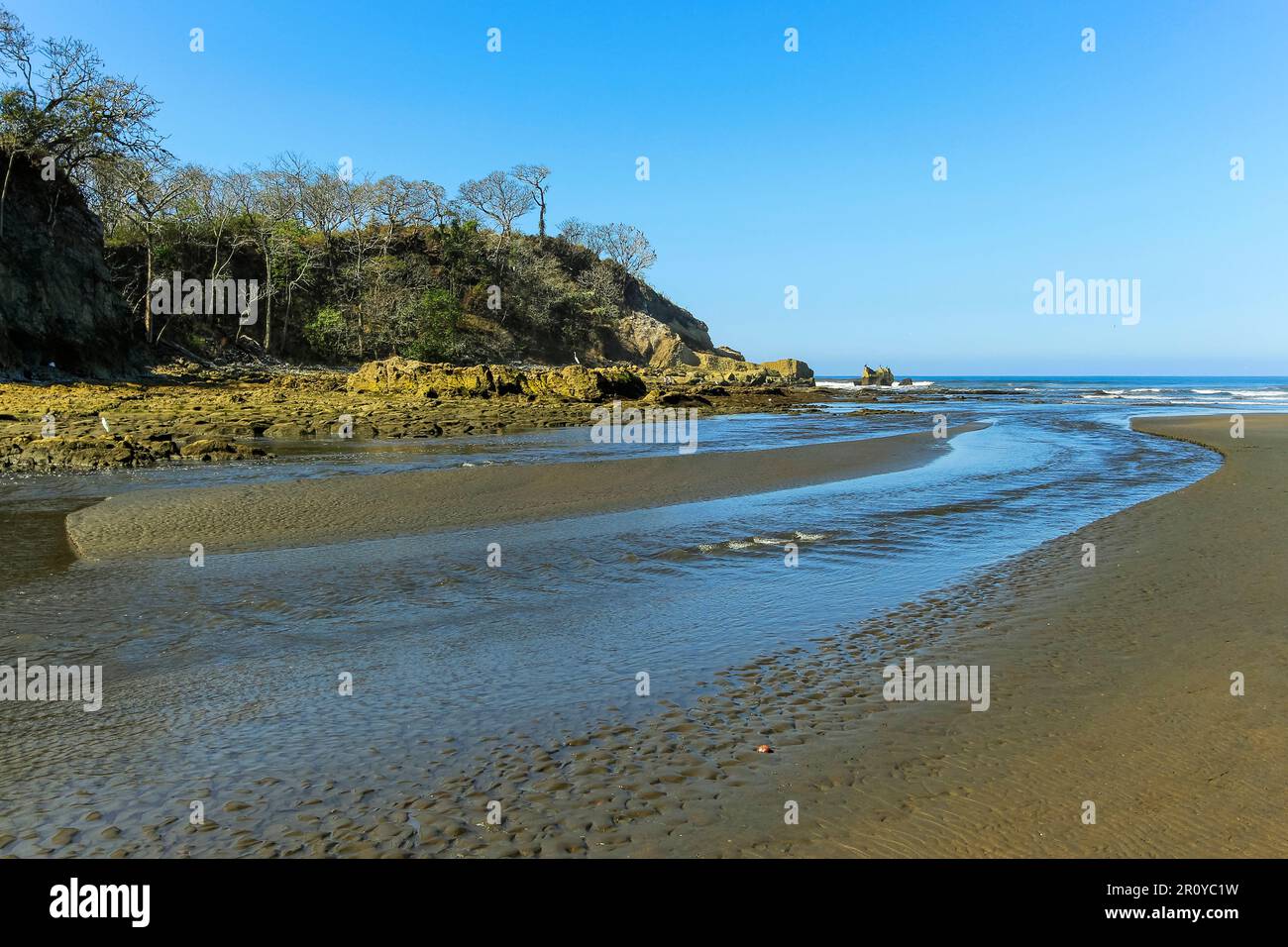 Nosara River estuary & mouth (boca) at low tide on Nosara Beach near ...