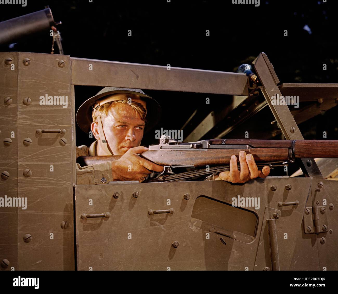 Halftrack infantryman with Garand rifle, Ft. Knox, Ky., June, 1942. In ...