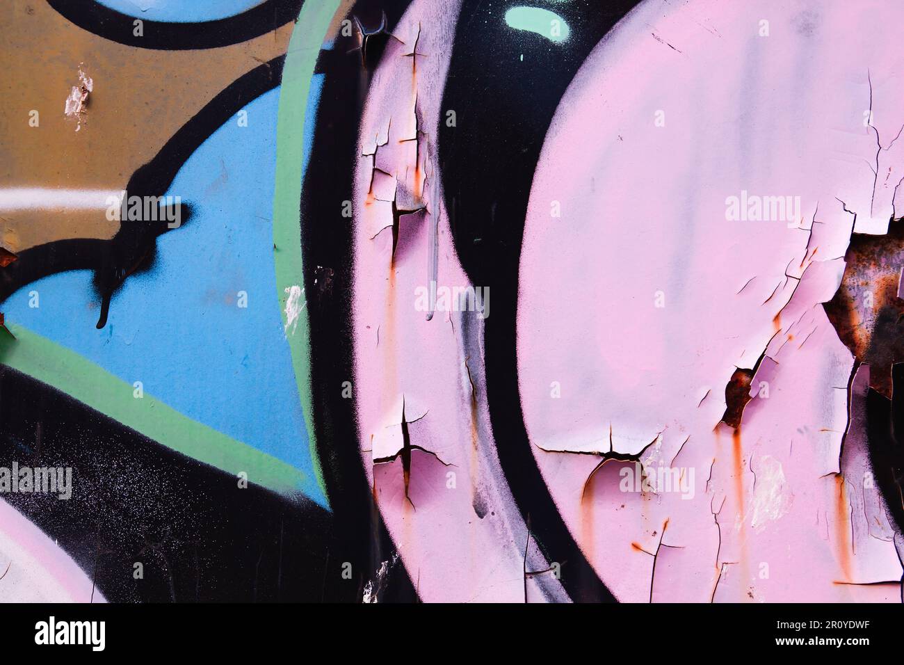 Detail of worn out graffiti paint on old rusty wall Stock Photo - Alamy