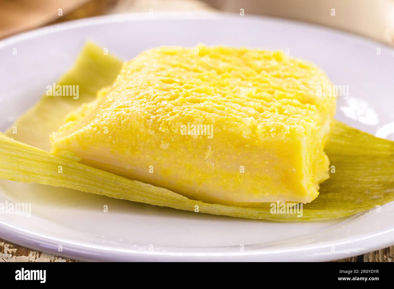 Brazilian sweet corn called Pamonha, made with fuba and corn, stuffed ...
