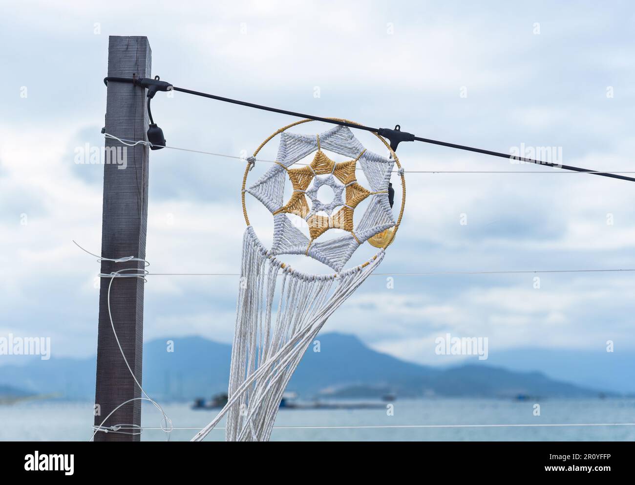 Example of usual star pattern knots of macrame technique made of white ...