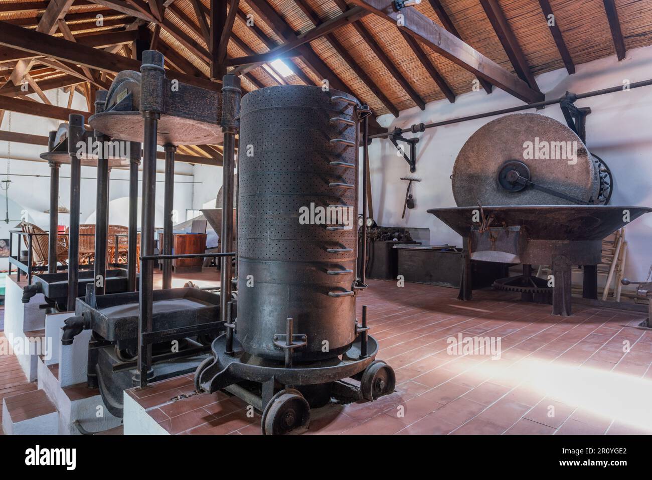 Olive oil press is installed in premises of the ancient equipment for ...