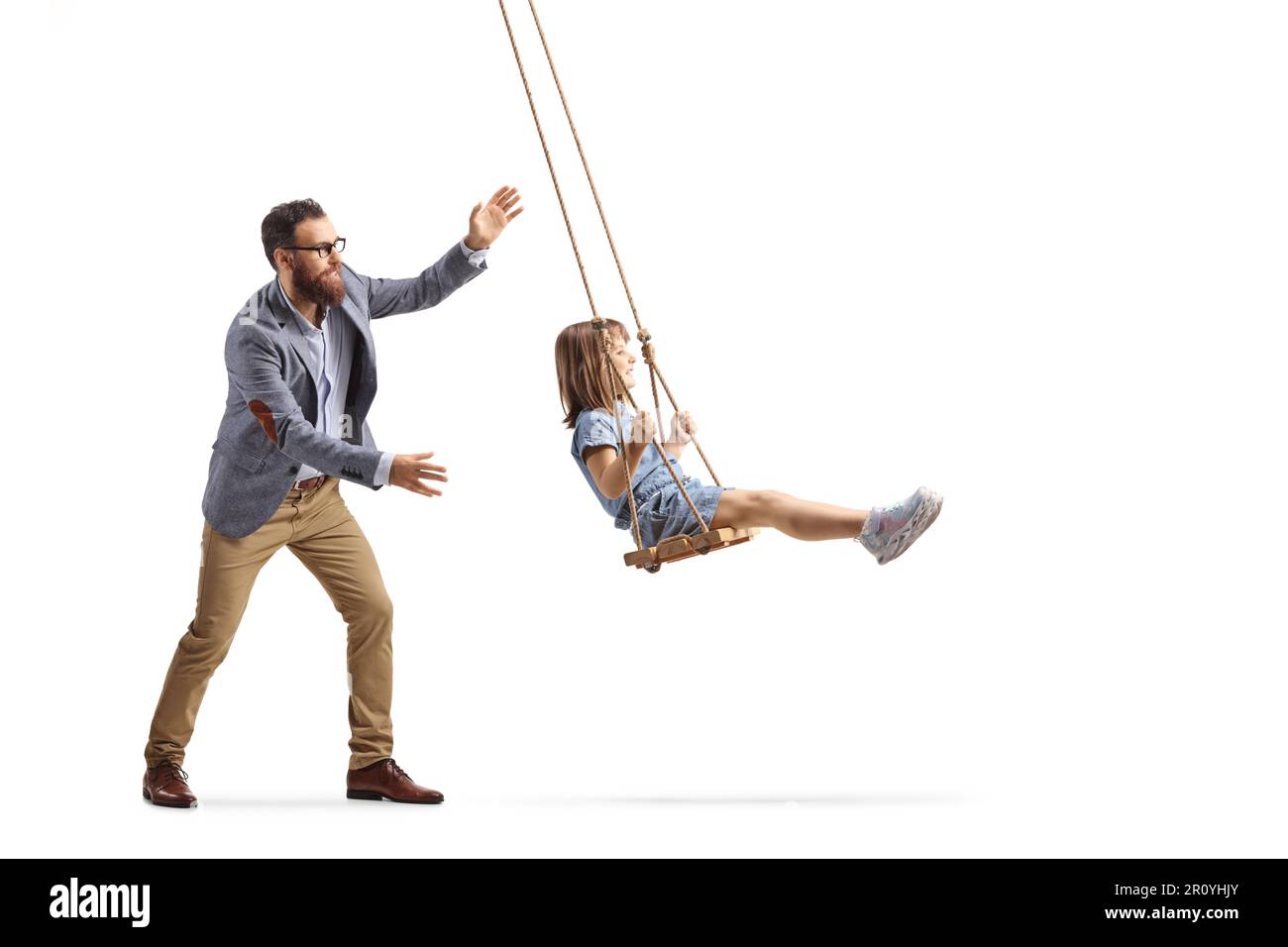 Father pushing a little girl on a swing isolated on white background Stock Photo - Alamy