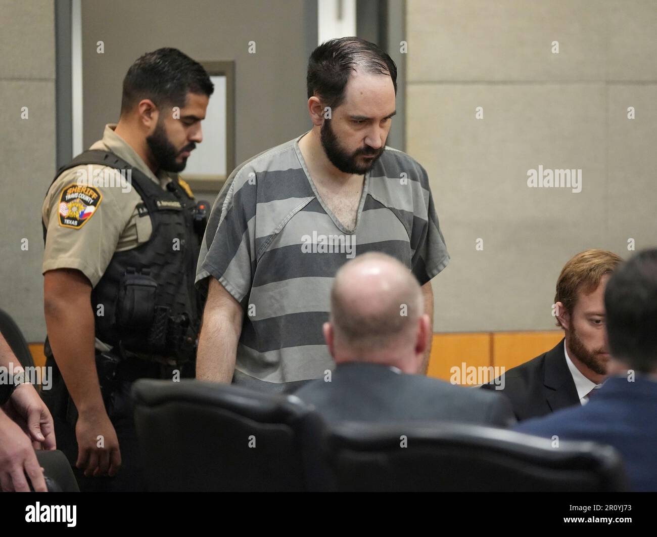Daniel Perry enters the courtroom at the Blackwell-Thurman Criminal ...