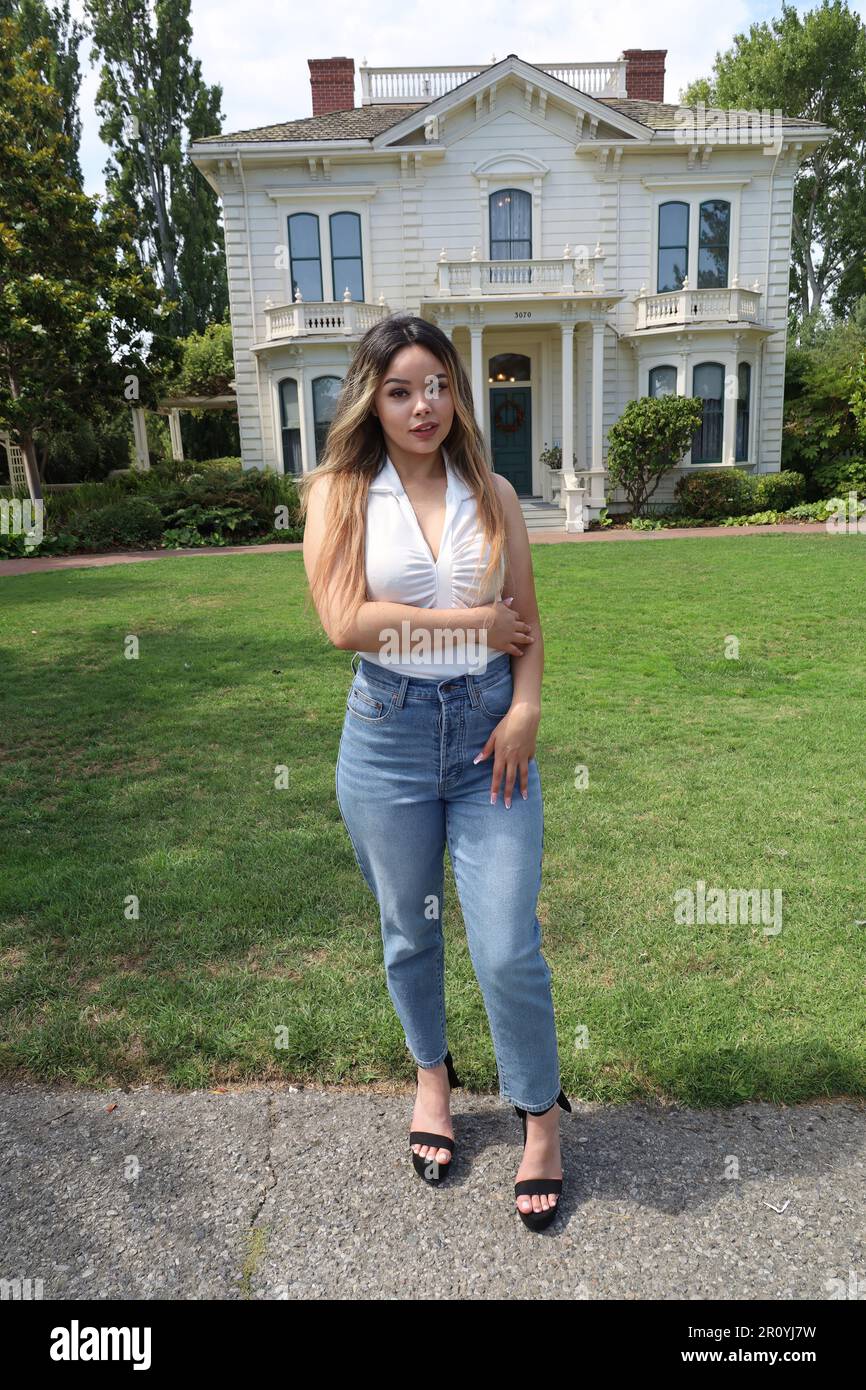 Photo of beautiful lady in a park on a summer day Stock Photo - Alamy