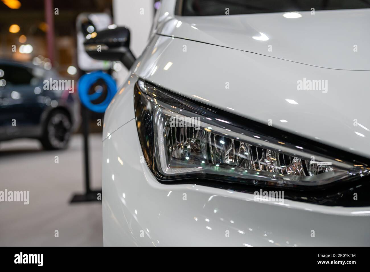 Riga, Latvia, April 28, 2023: LED headlights and car design closeup of nev Cupra Born electric ...