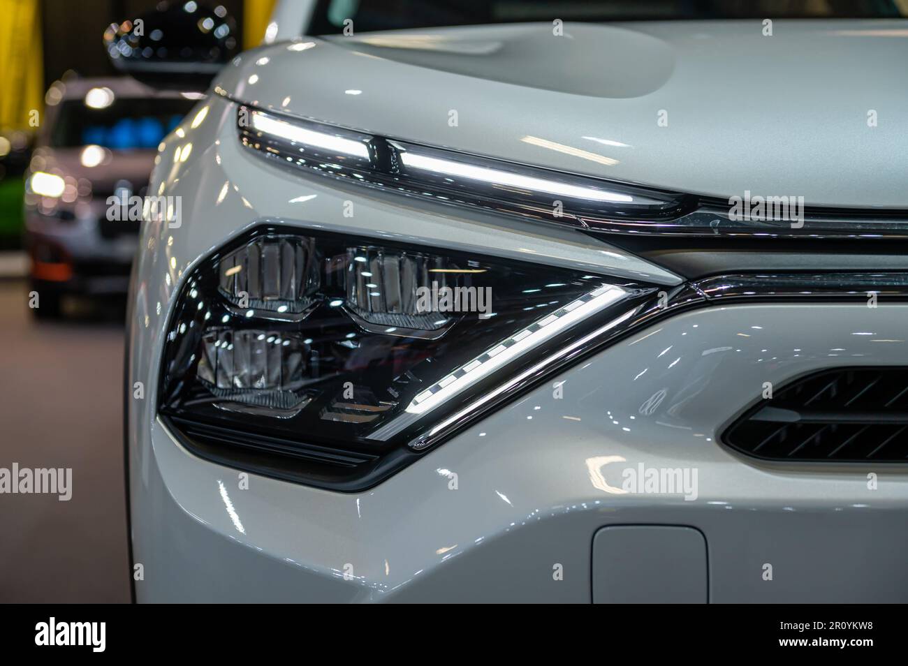 Riga, Latvia, April 28, 2023: LED headlights and car design closeup of nev Citroen C4 X coupe ...