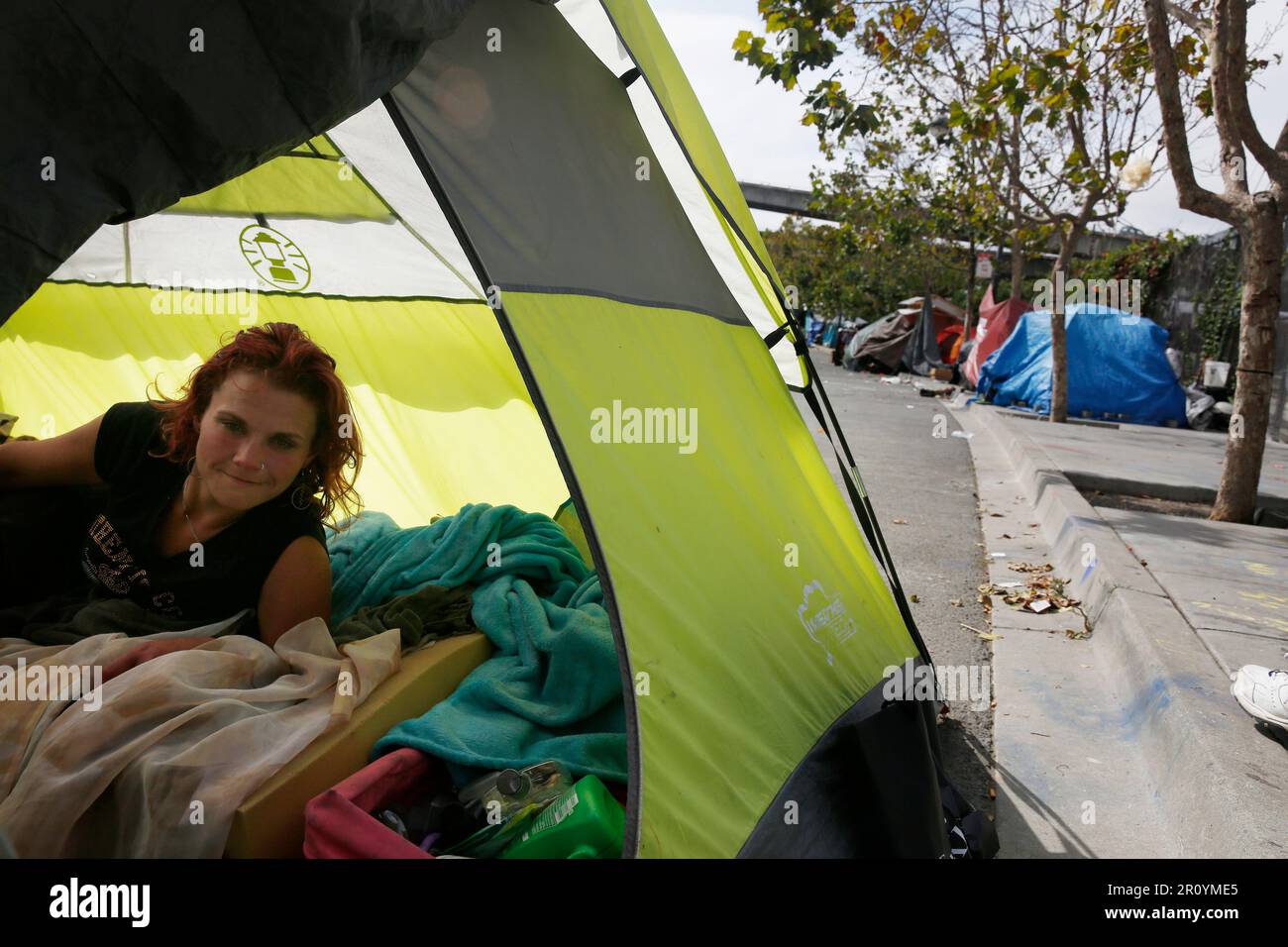 Erin Nitsche lays in her tent at the homeless encampment along King ...
