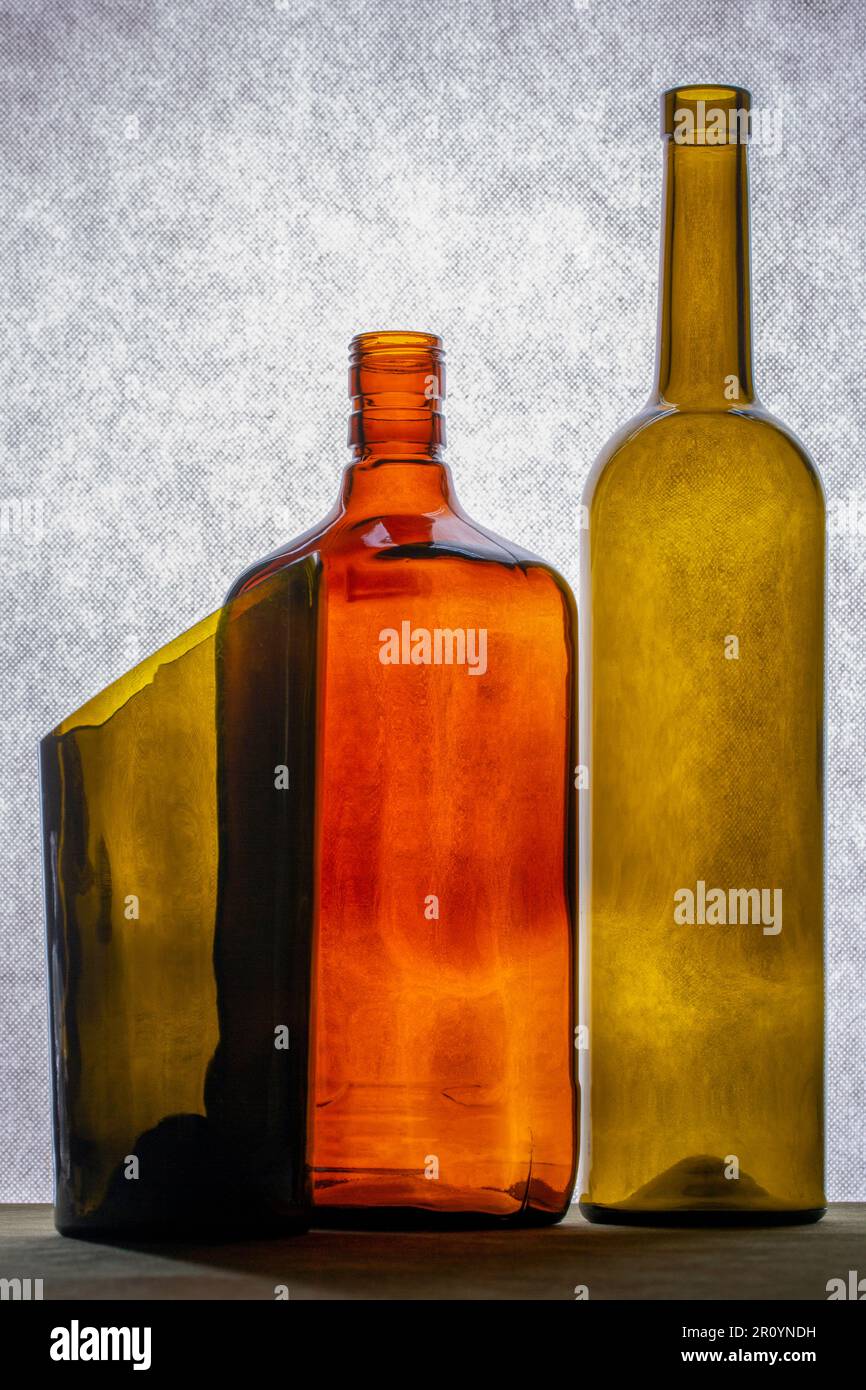 Still life with glass objects on a gray background Stock Photo - Alamy