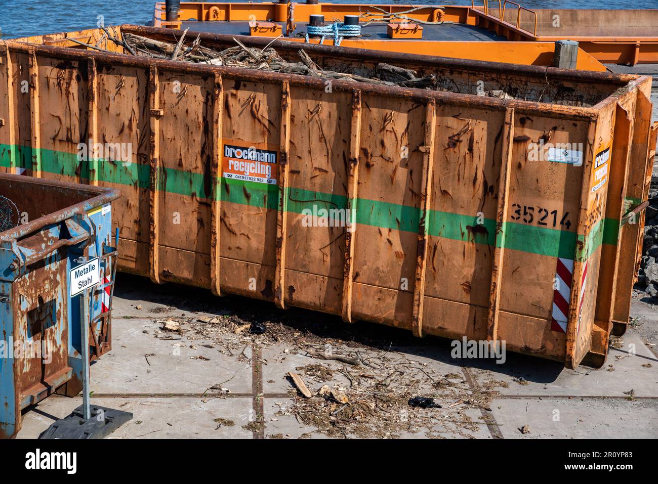Hamburg, Germany - 04 17 2023: Close-up of a large orange container for ...