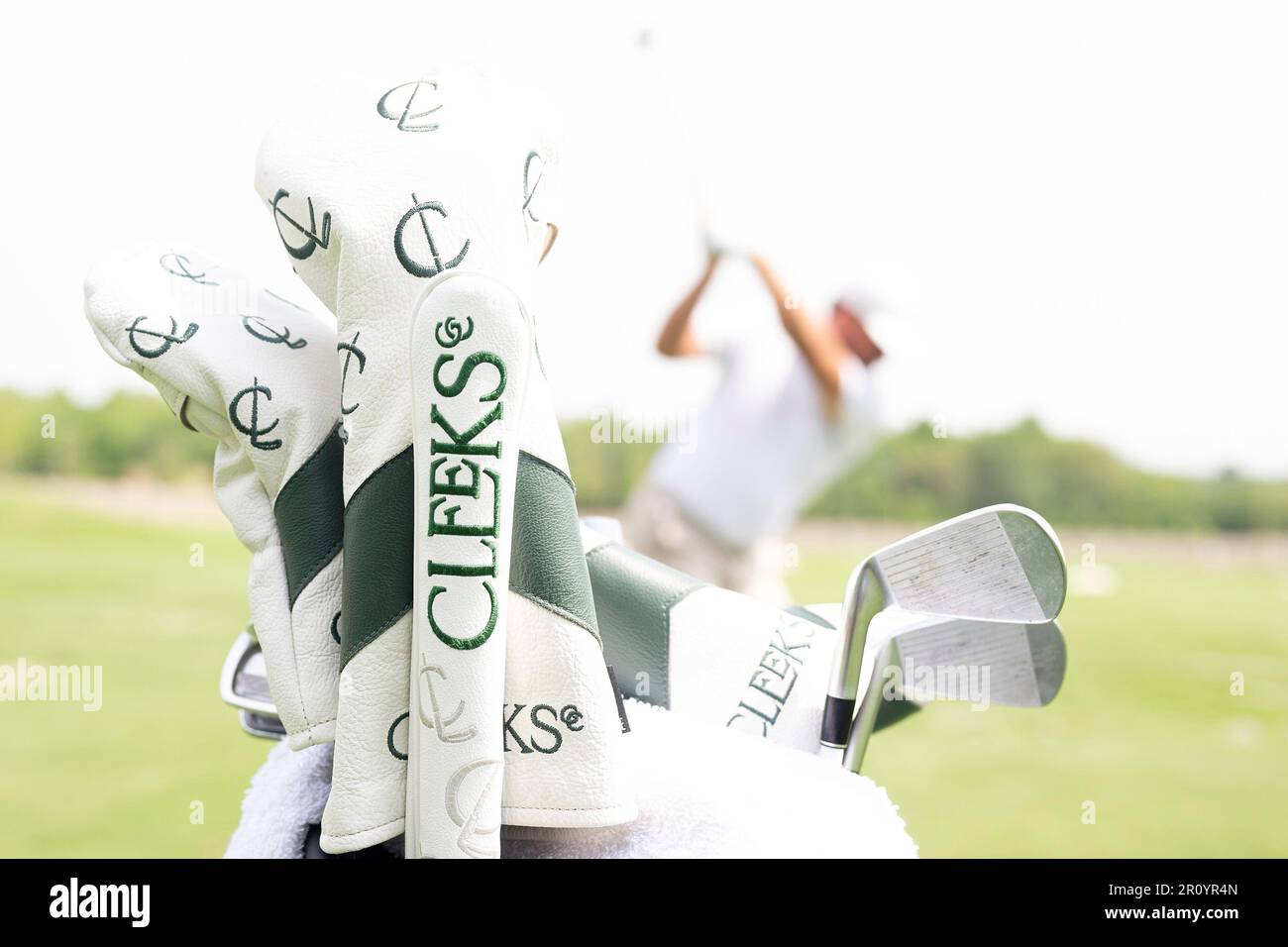 Graeme McDowell of Cleeks GC hits his shot on the driving range during ...