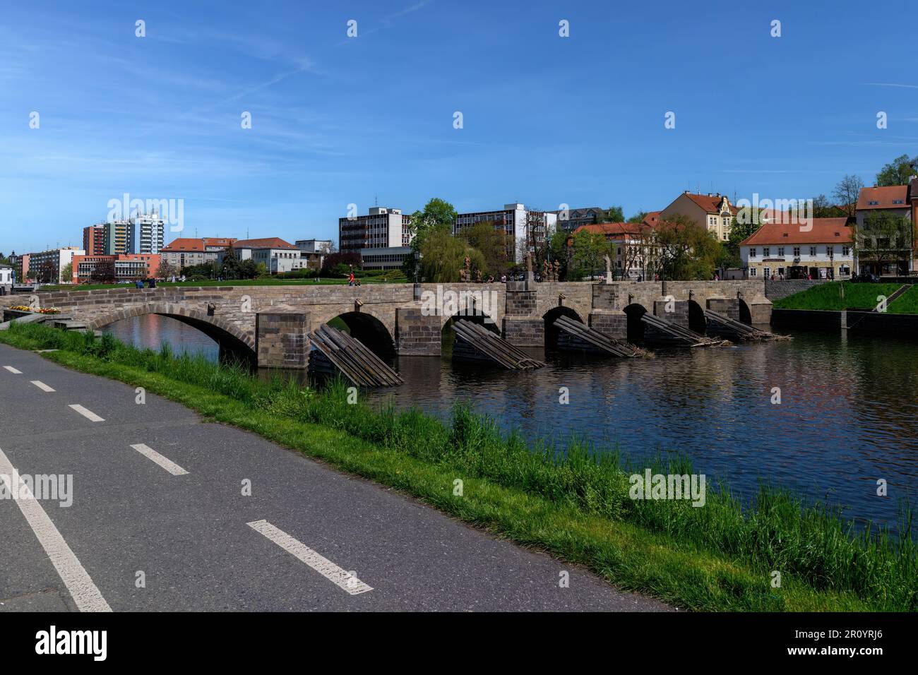 Historic stone bridge over river Otava in medieval town Pisek (Southern ...