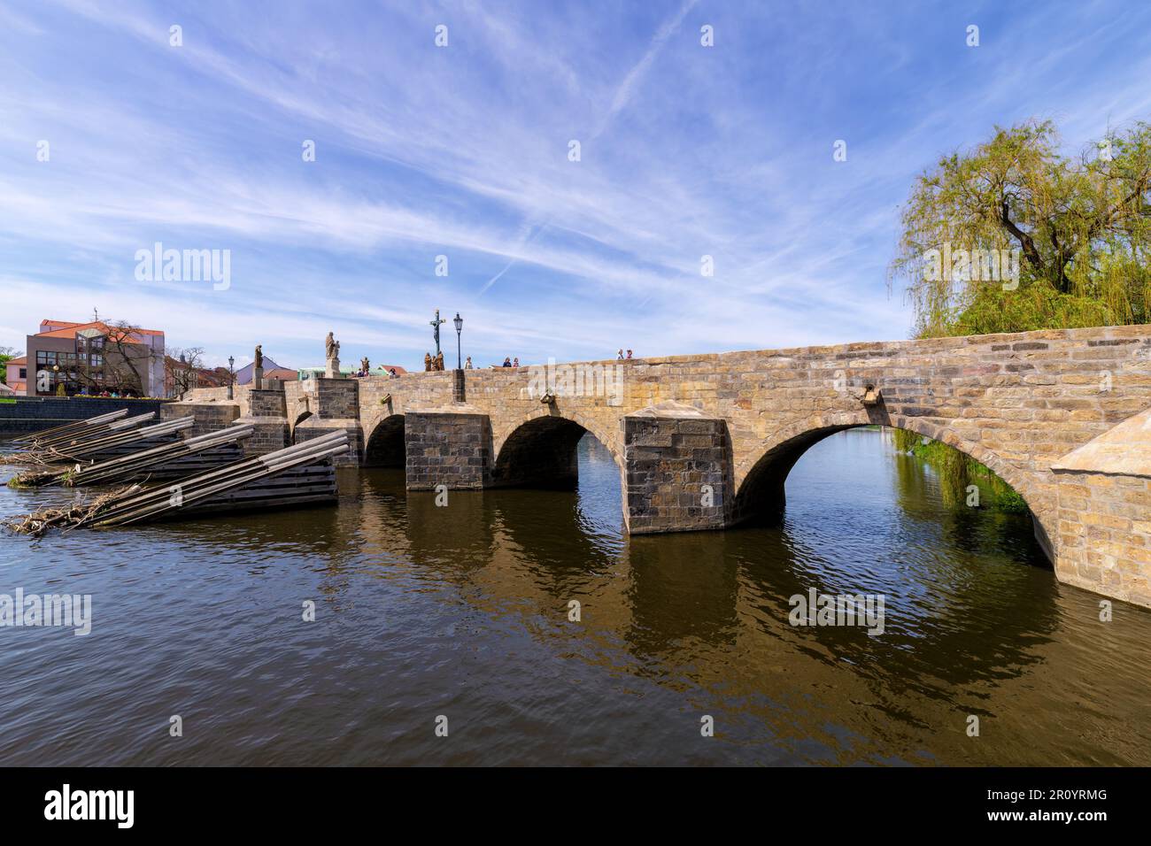 Historic stone bridge over river Otava in medieval town Pisek (Southern ...