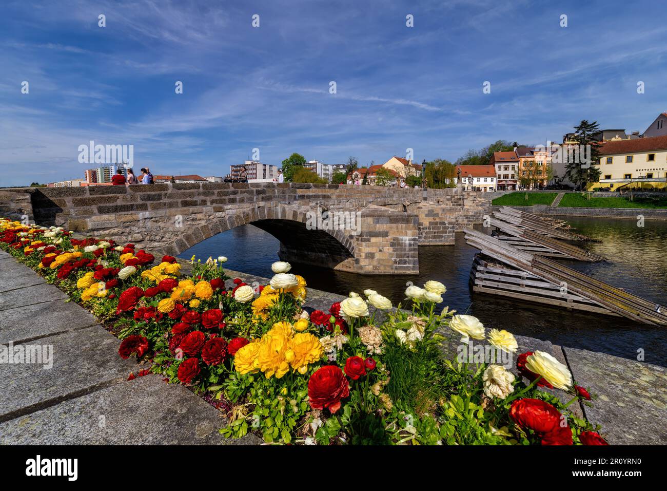 Historic stone bridge over river Otava in medieval town Pisek (Southern ...