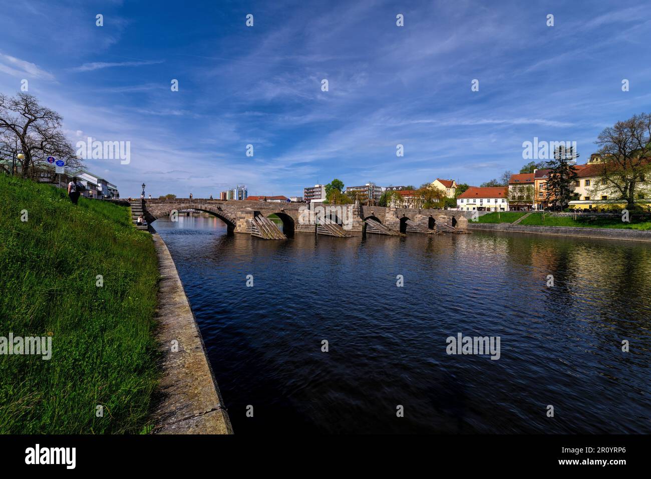 Historic stone bridge over river Otava in medieval town Pisek (Southern ...