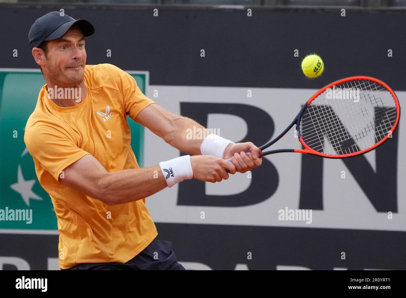 Britain's Andy Murray returns the ball to Italy's Fabio Fognini during their match at the ...