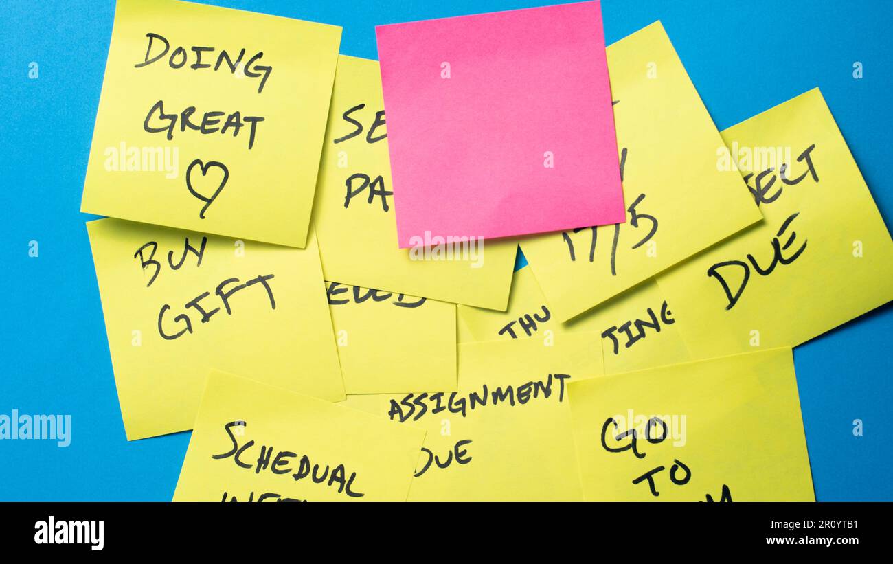 Sticky Notes on a Blue Wall Stock Photo - Alamy