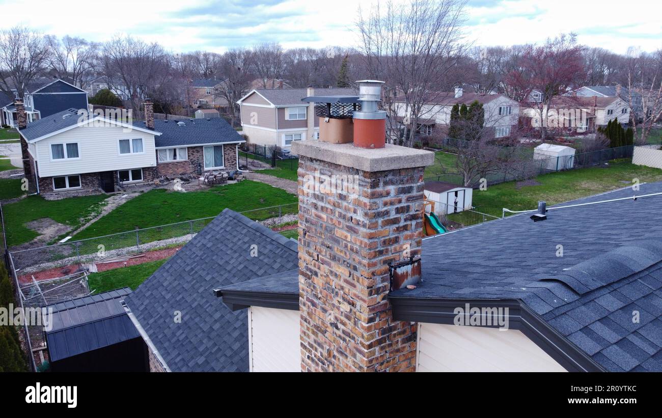 A chimney that was torn down and had the top portion rebuilt Stock ...