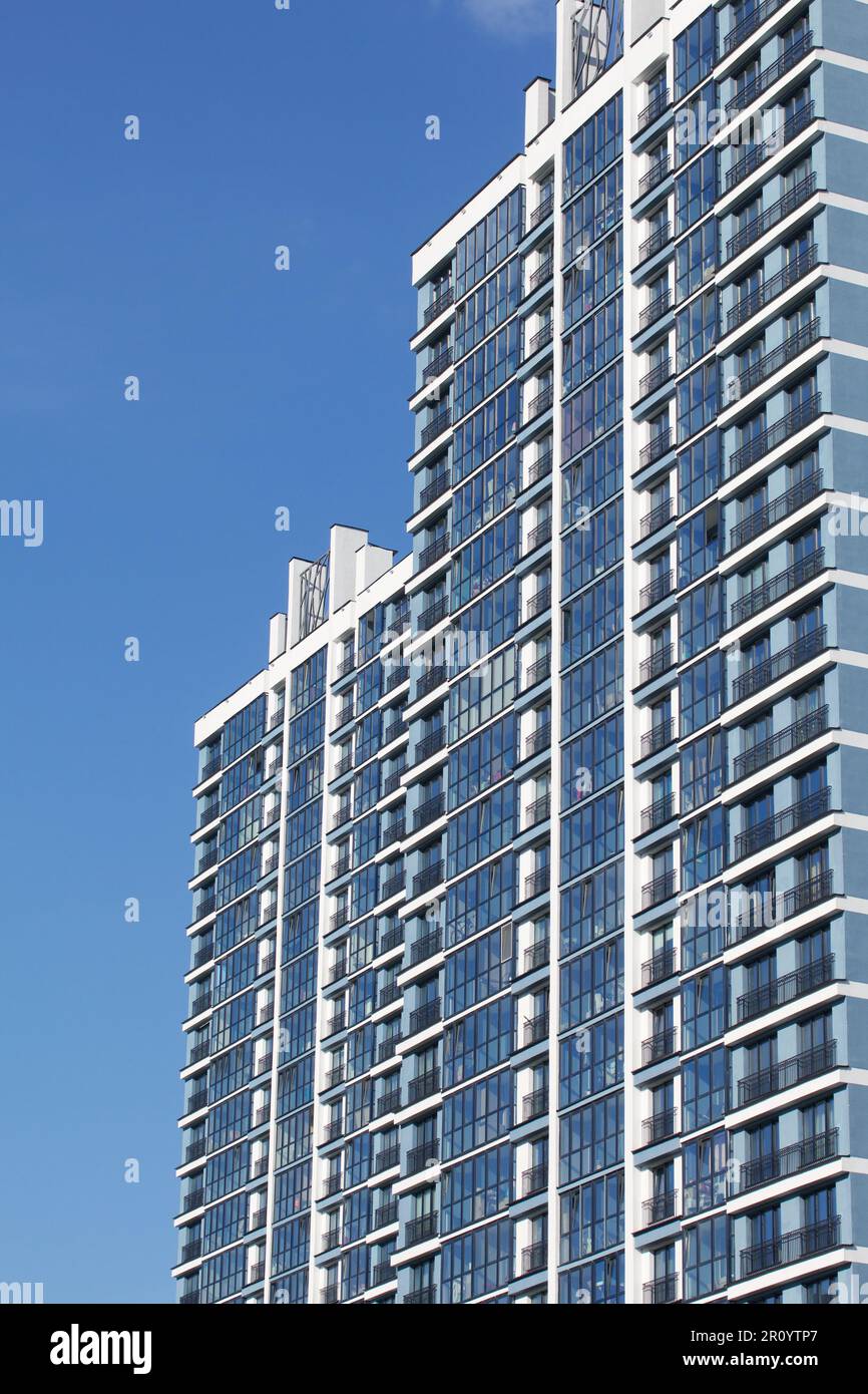 Modern high-rise buildings made of concrete and glass. Construction ...