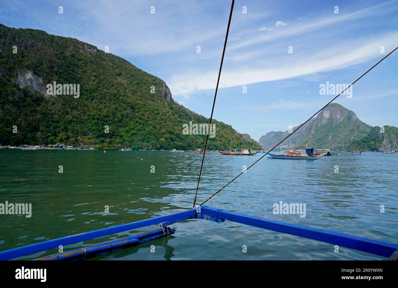 wooden traditional outrigger boats on palawan island at the philippines ...