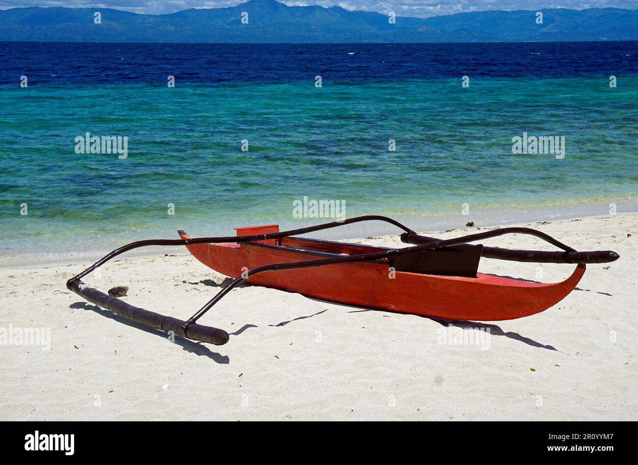 traditional outrigger boats at the beach of bohol on the philippines ...