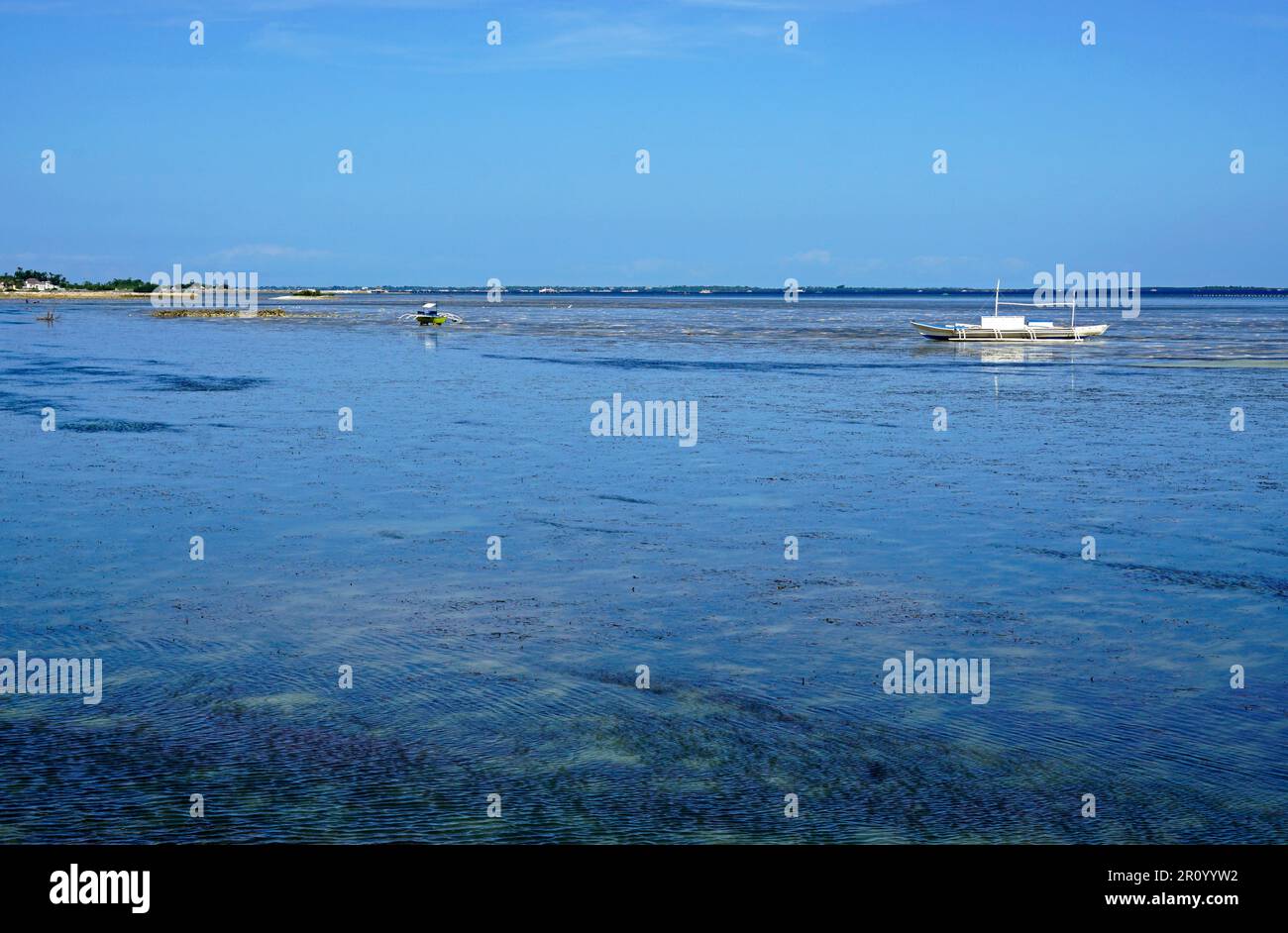 traditional small wooden outrigger boats at a fisherman village Stock ...