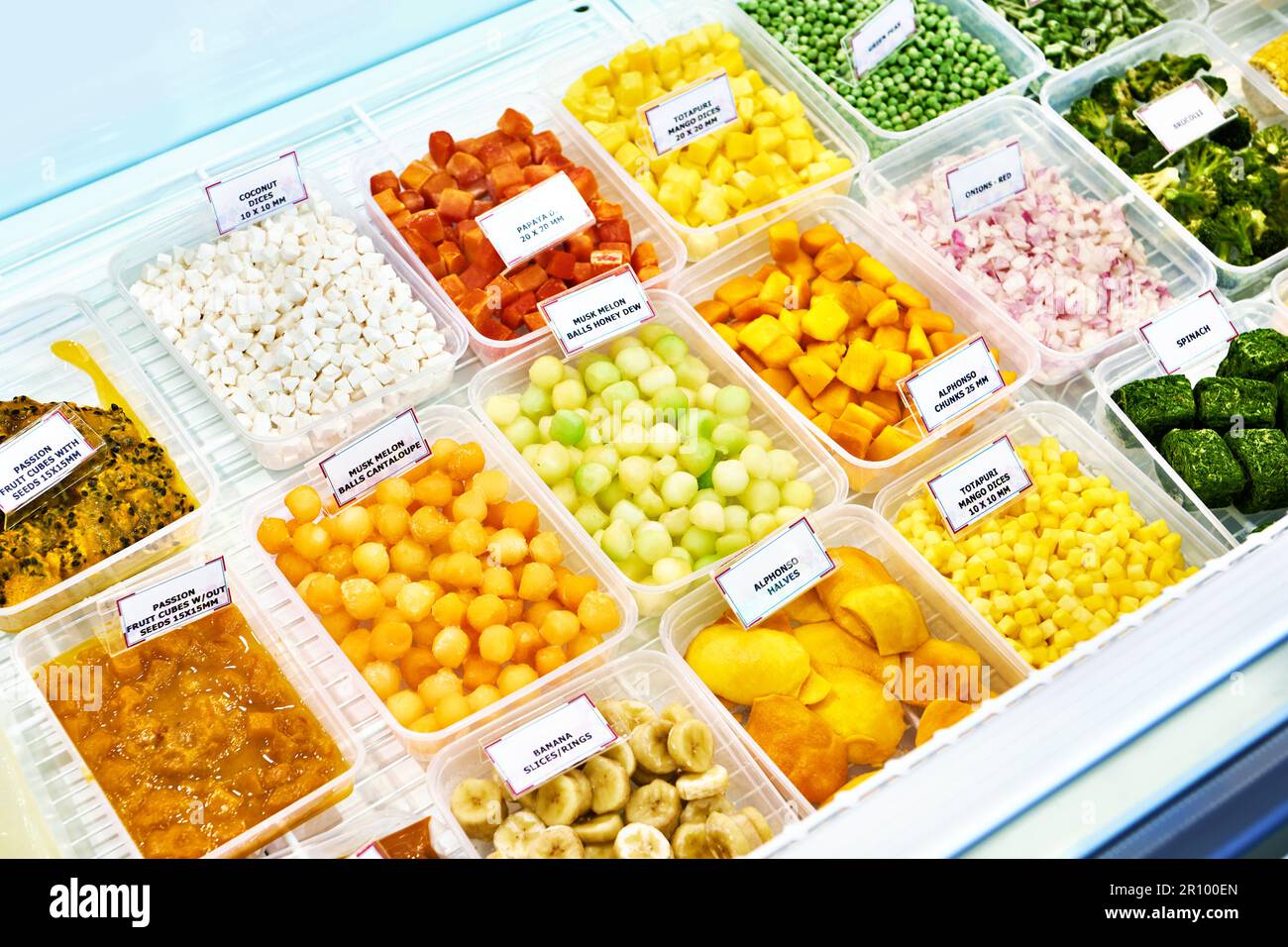 Chilled slices of fruits and vegetables on a store counter Stock Photo ...