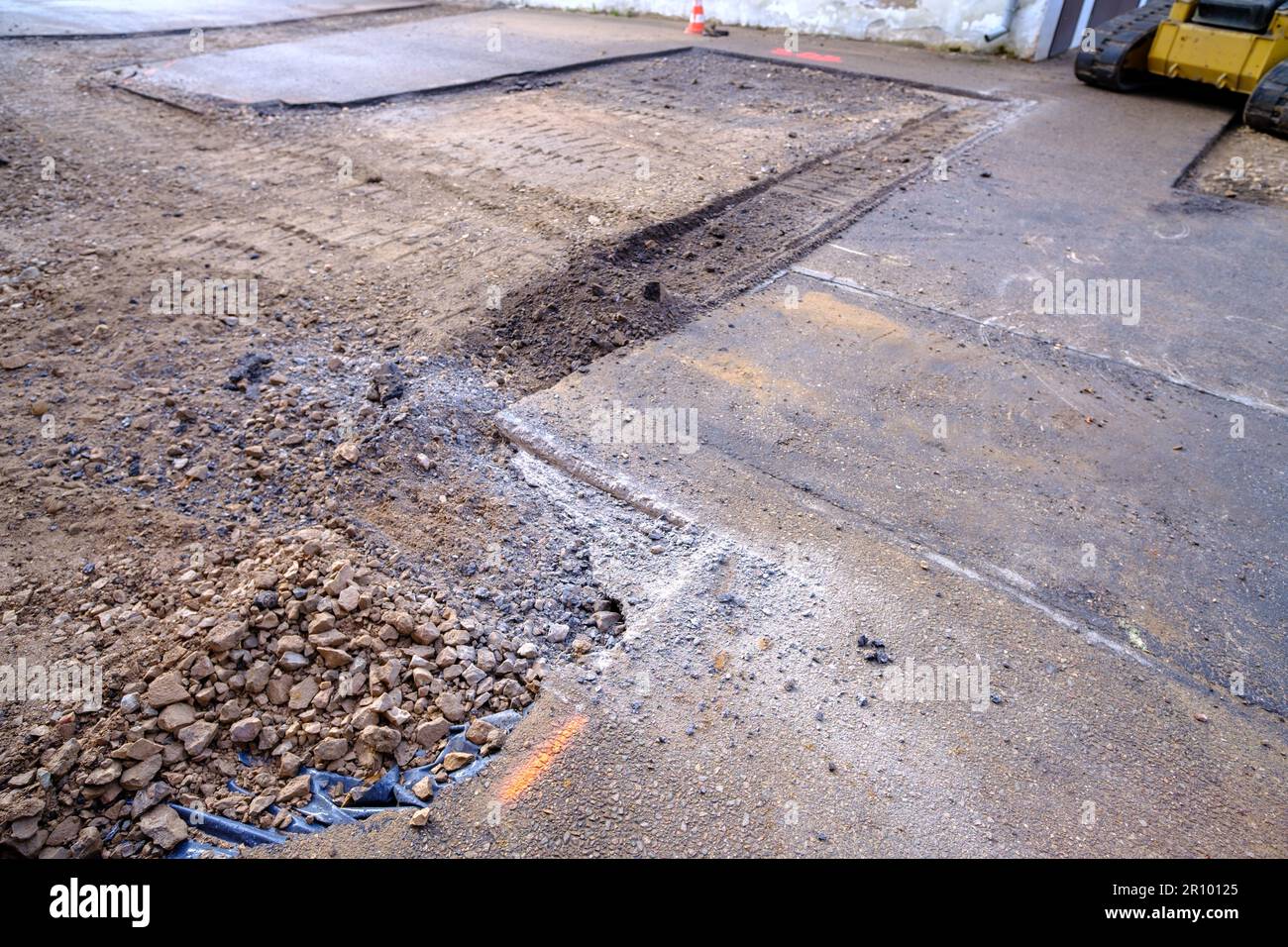 Milling of the road surface for laying new asphalt. Background of ...