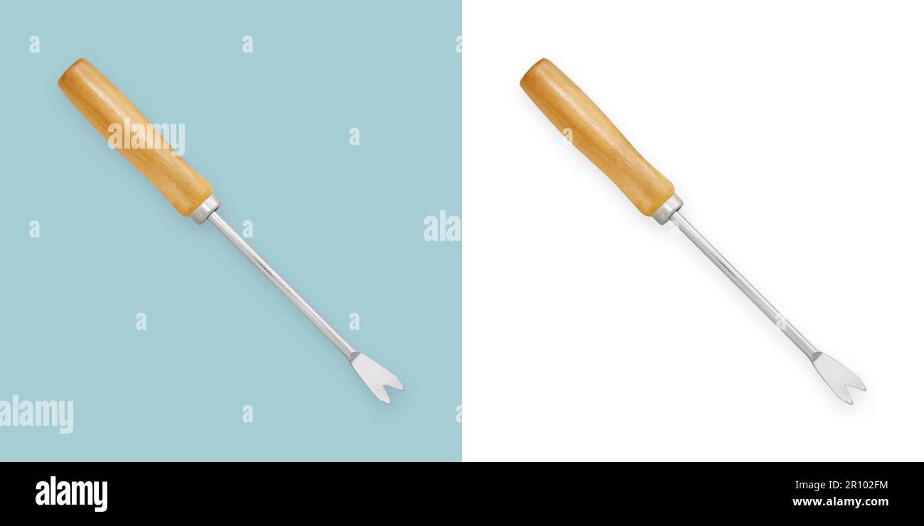 Garden weed removal hand tool with wooden handle. Top view isolated on ...