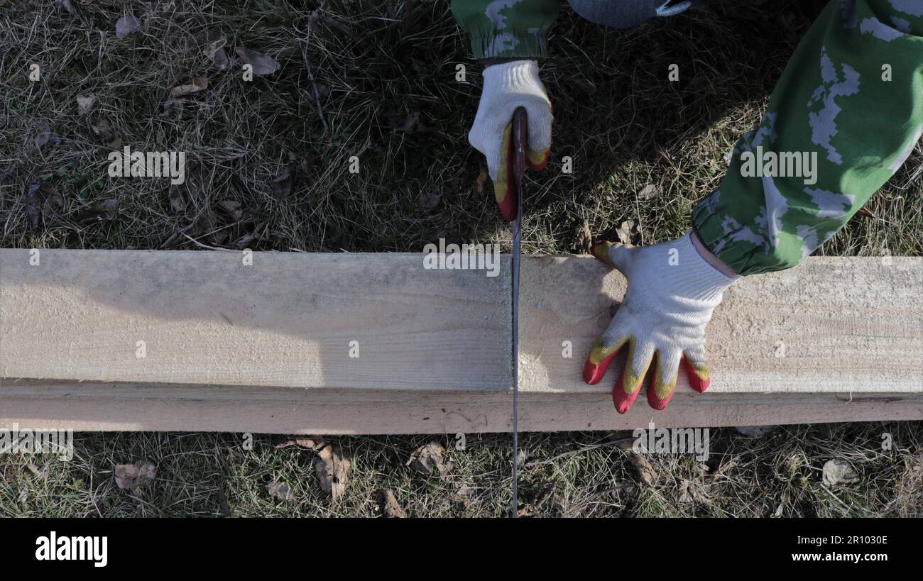 Hands man sawing top view hi-res stock photography and images - Alamy