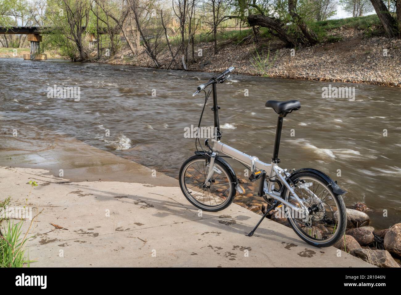 lightweight folding bike at whitewater park on the Poudre River in ...