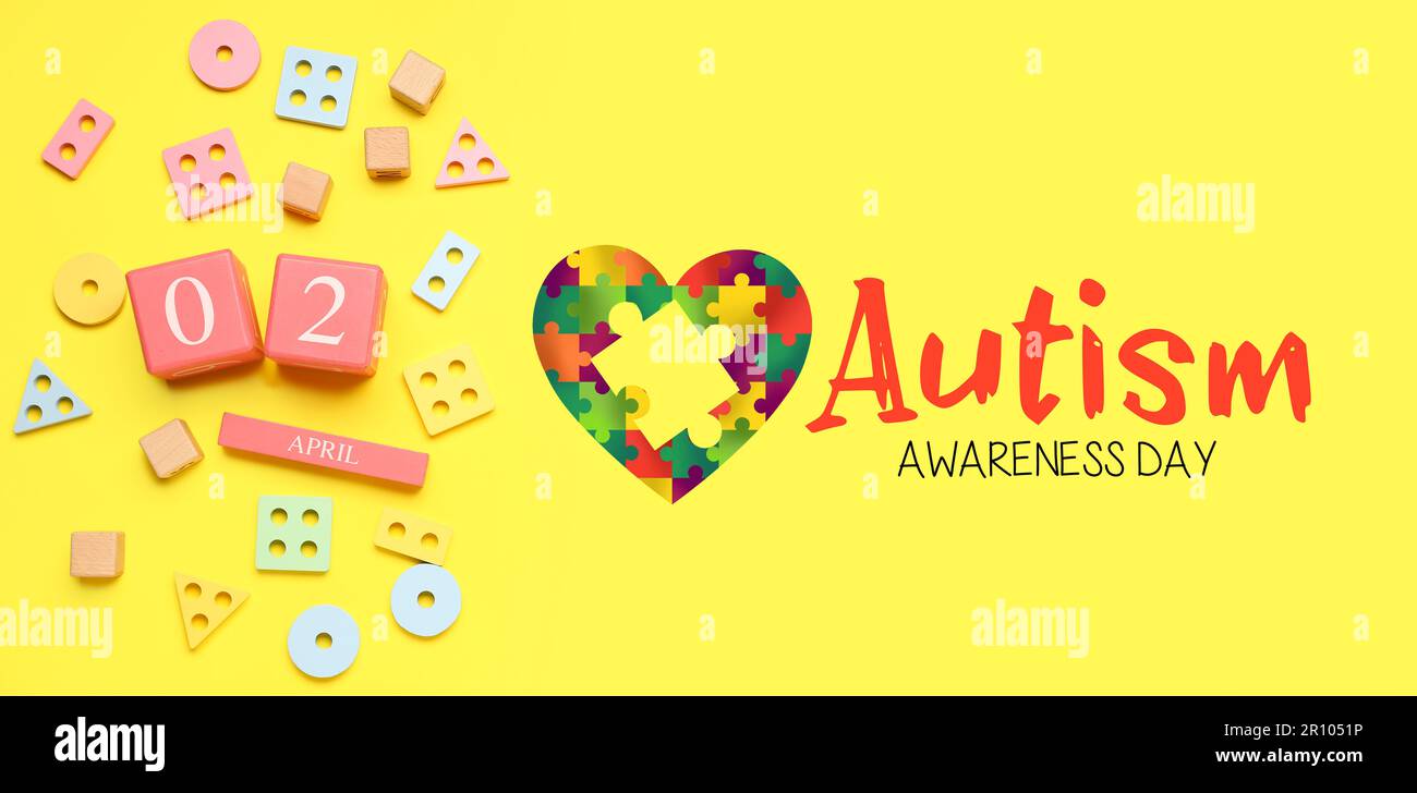 Calendar with date of World Autism Awareness Day and baby toys on ...