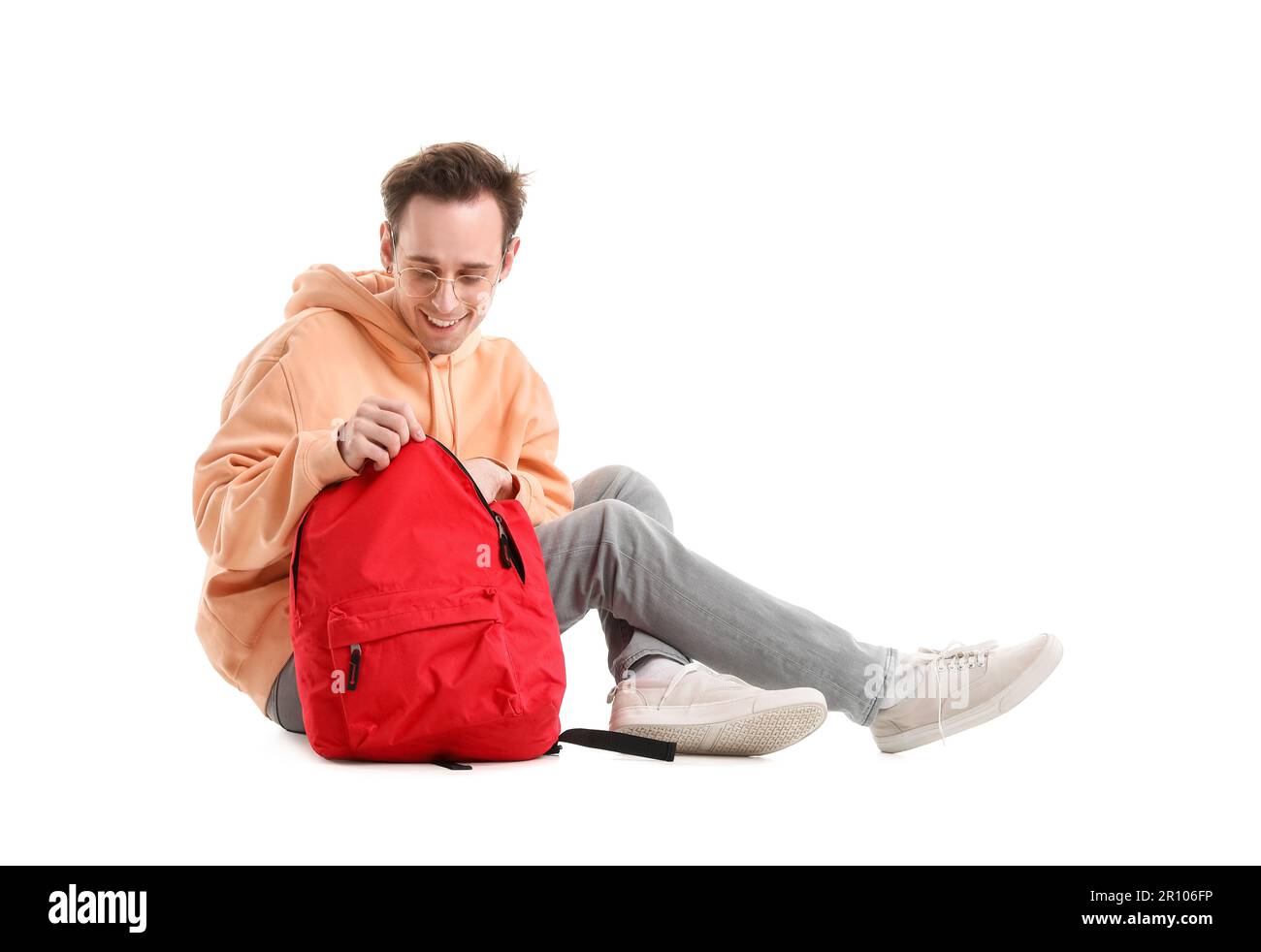 Male student with backpack on white background Stock Photo - Alamy