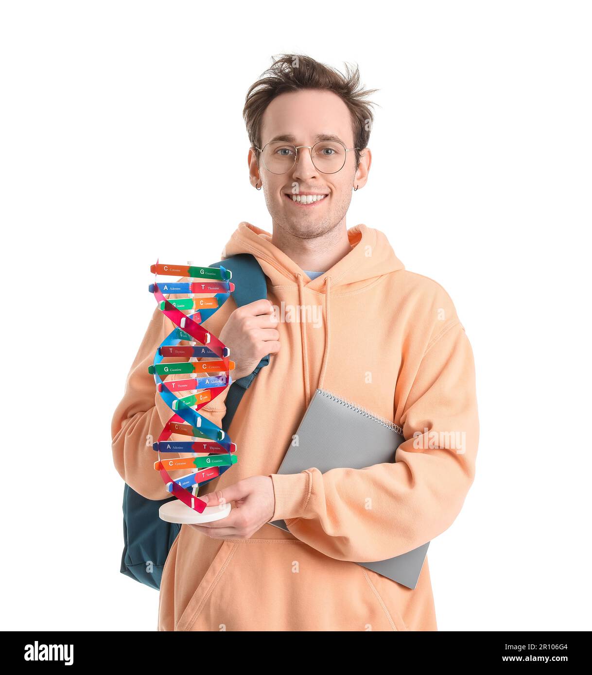 Male student with model of DNA on white background Stock Photo - Alamy