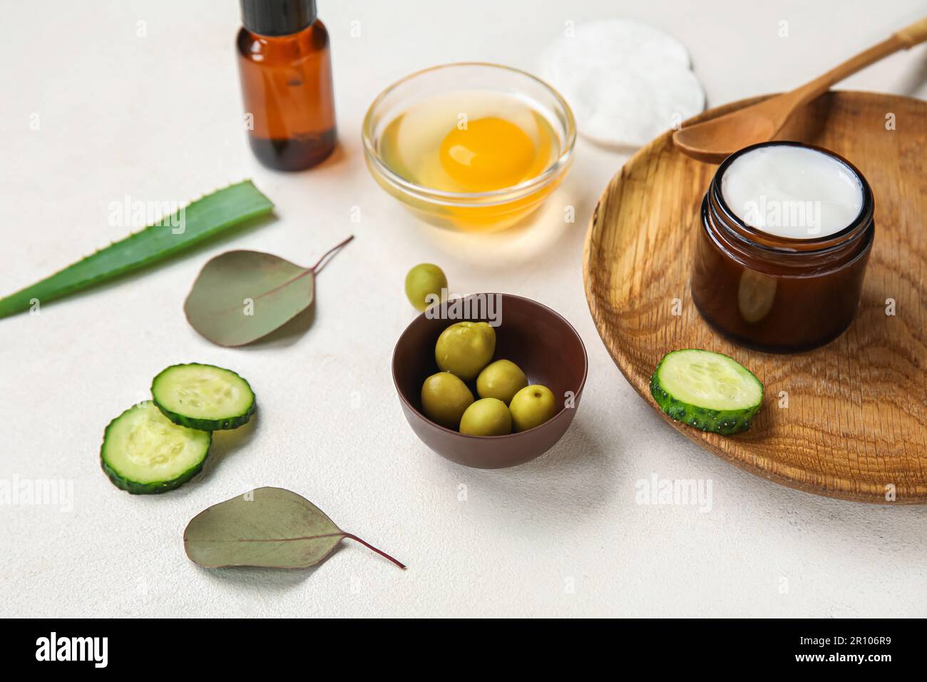 Composition with natural cosmetics and ingredients on light background ...