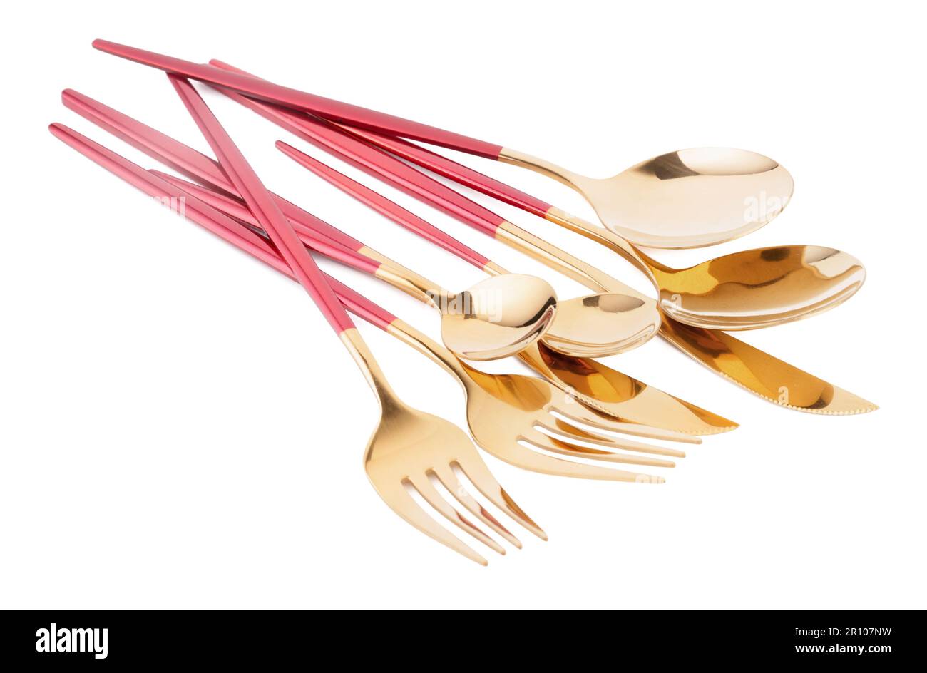 Golden set of cutlery with red handles on white background Stock Photo ...