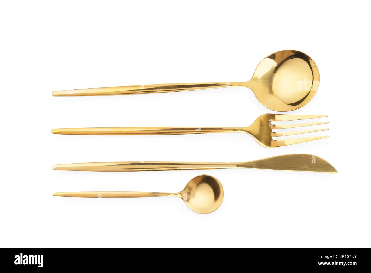 Stylish golden cutlery set Cut Out Stock Images & Pictures - Alamy