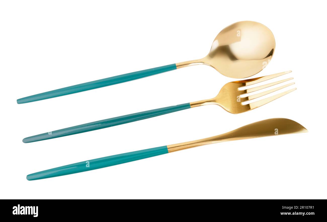 Golden cutlery on top Cut Out Stock Images & Pictures - Alamy