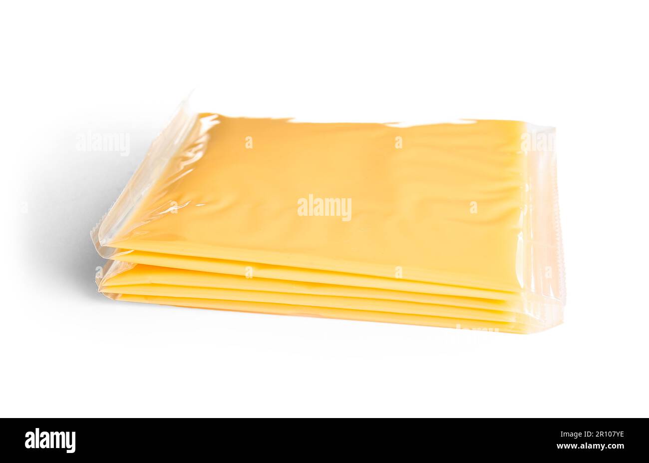 Square slices processed cheddar Cut Out Stock Images & Pictures - Alamy