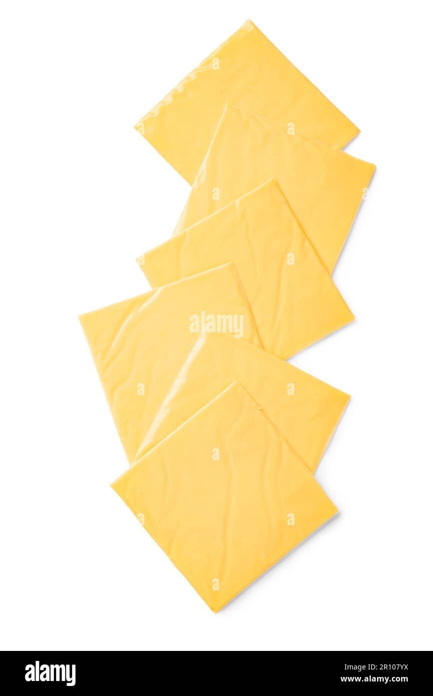 Pieces of cheddar cheese top view Cut Out Stock Images & Pictures - Alamy
