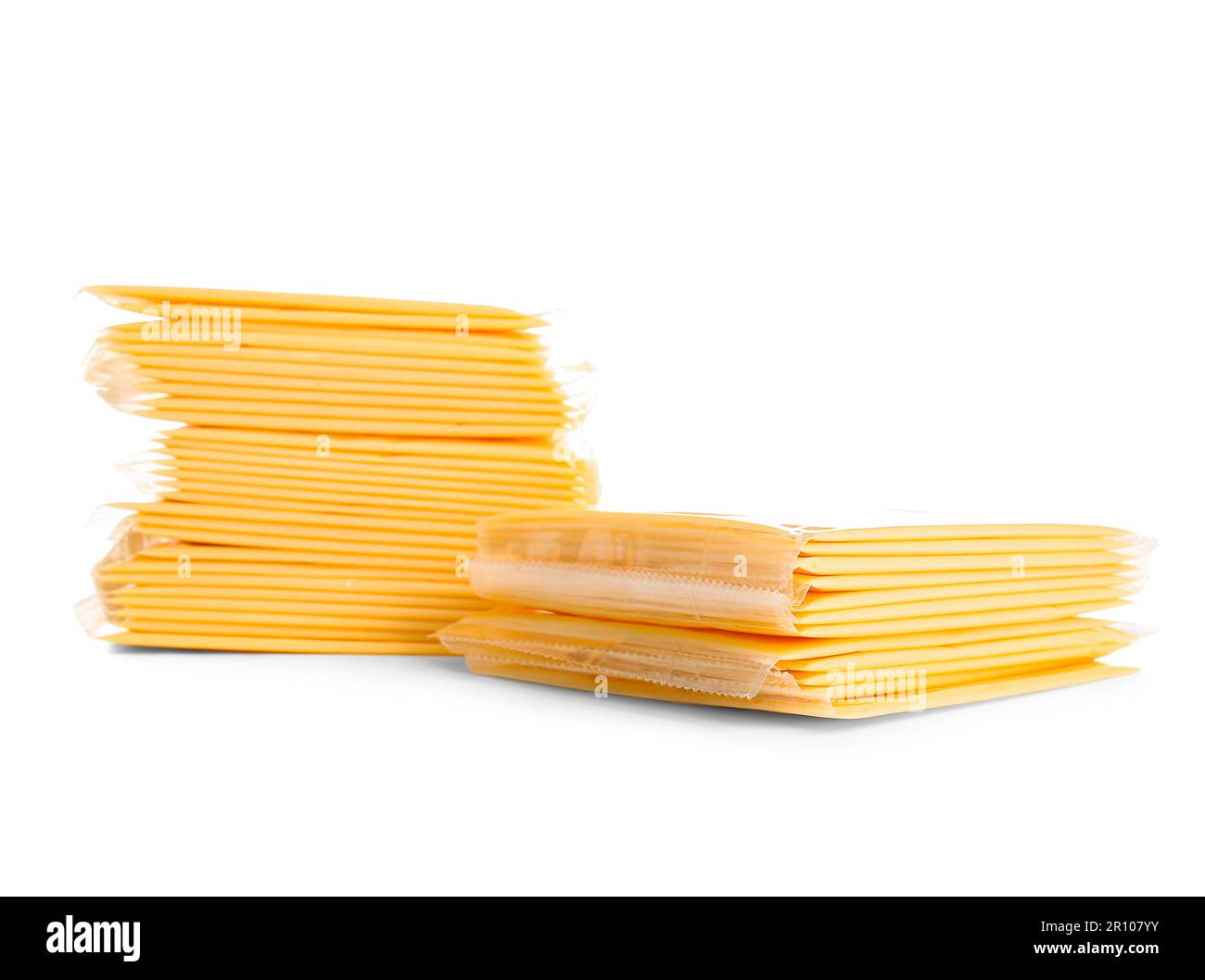 Slices of tasty processed cheese on white background Stock Photo - Alamy