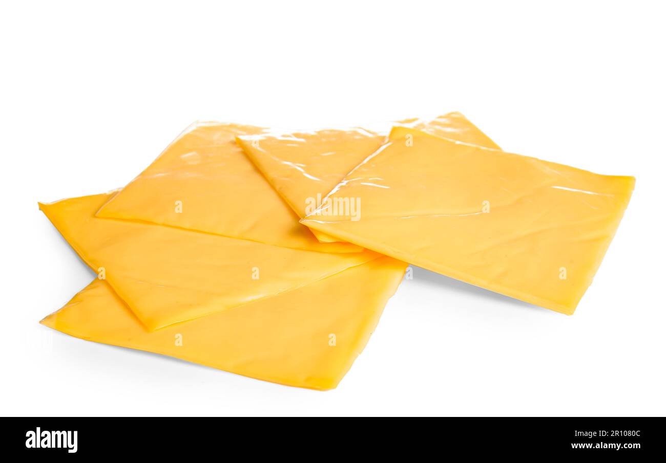 Square slices processed cheddar Cut Out Stock Images & Pictures - Alamy