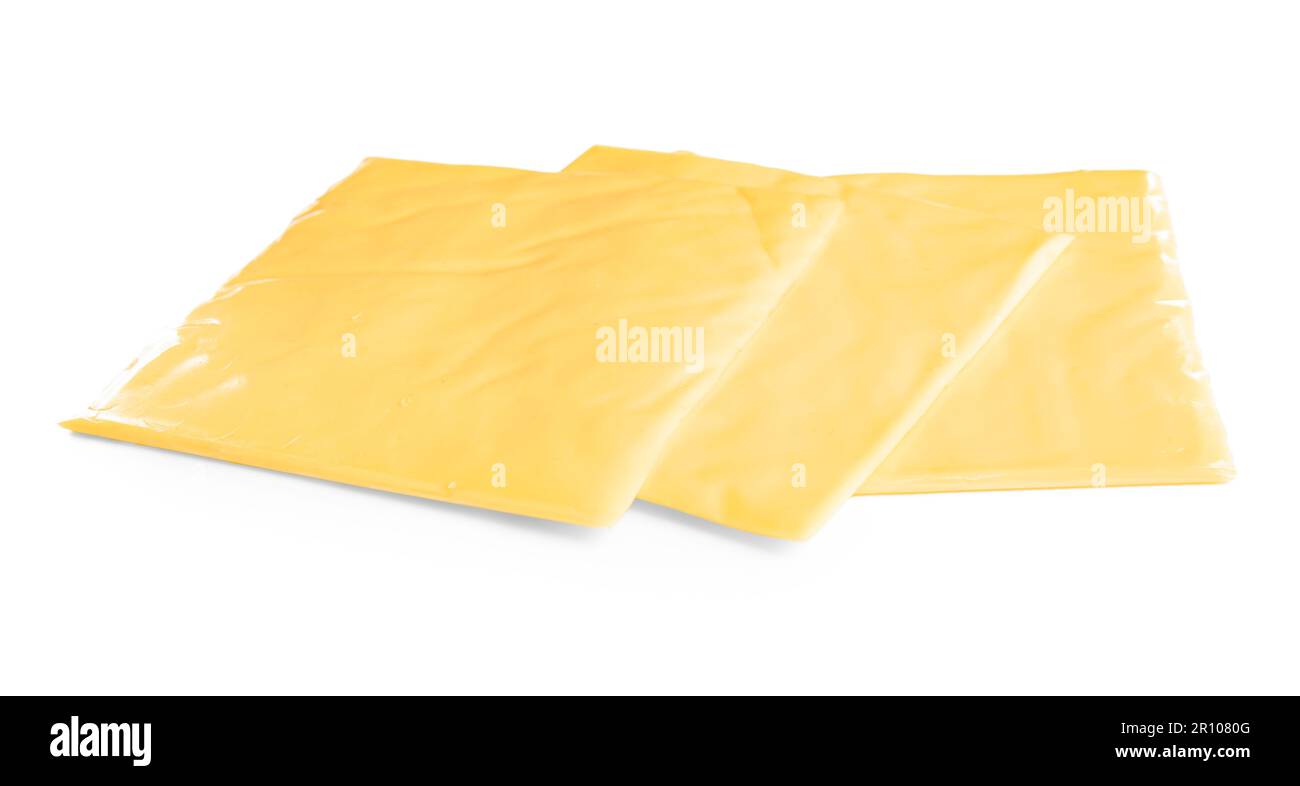 Slices of tasty processed cheese on white background Stock Photo - Alamy