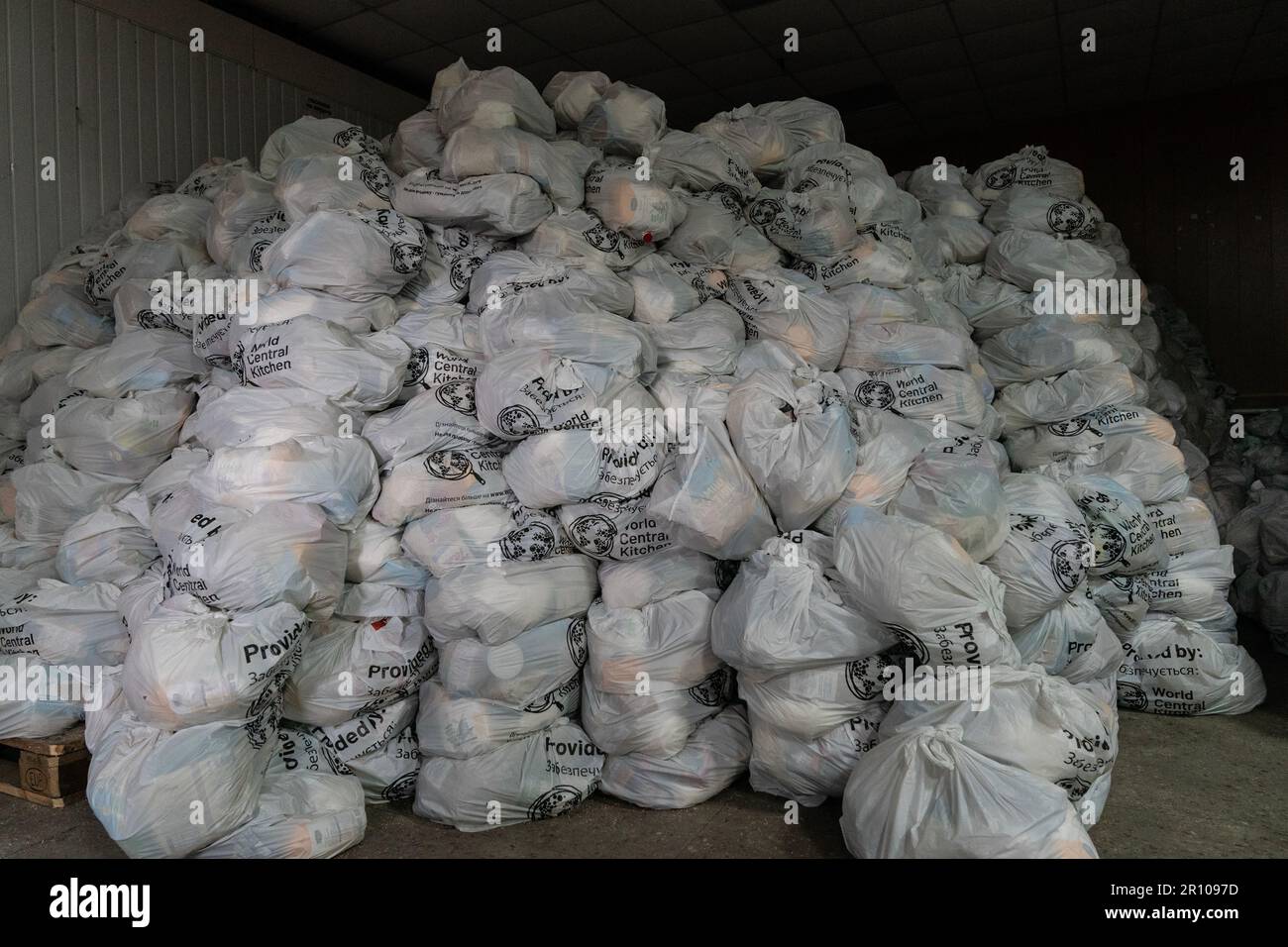 Bags of donated food supplies prepared by World Central Kitchen in ...