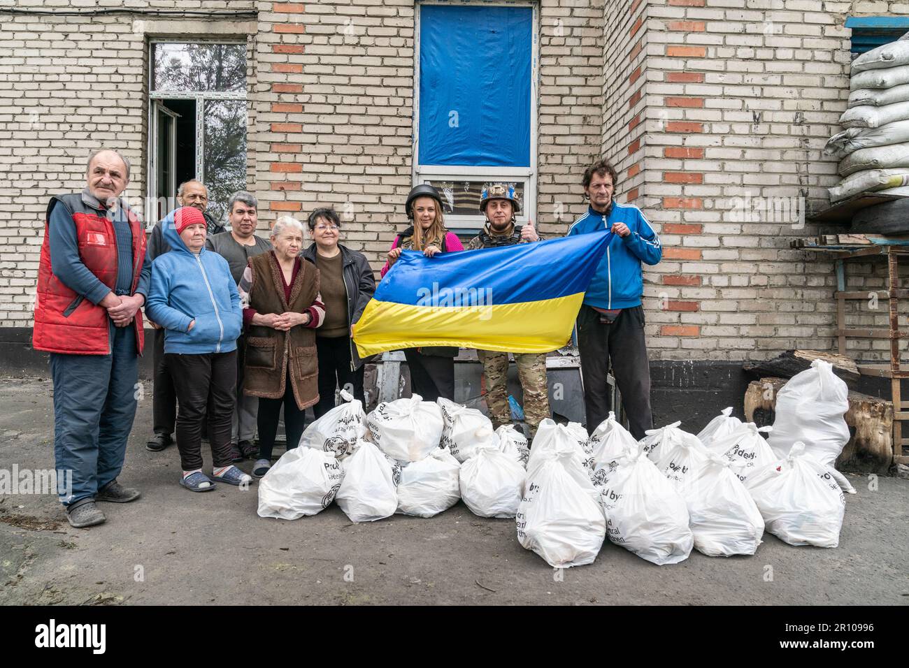 Members of police, volunteer of World Central Kitchen and dwellers of ...
