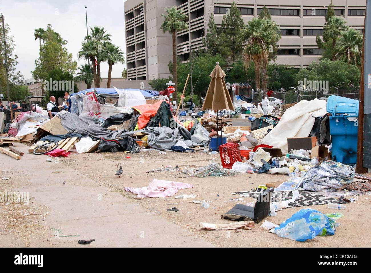 The city of Phoenix begins cleanup in ‘The Zone', a downtown Phoenix homeless encampment in ...