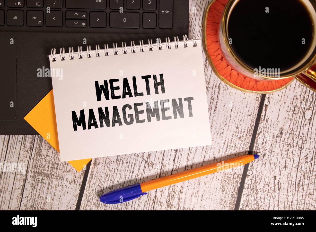 Wealth management is shown using a text and pictures of dollars Stock ...